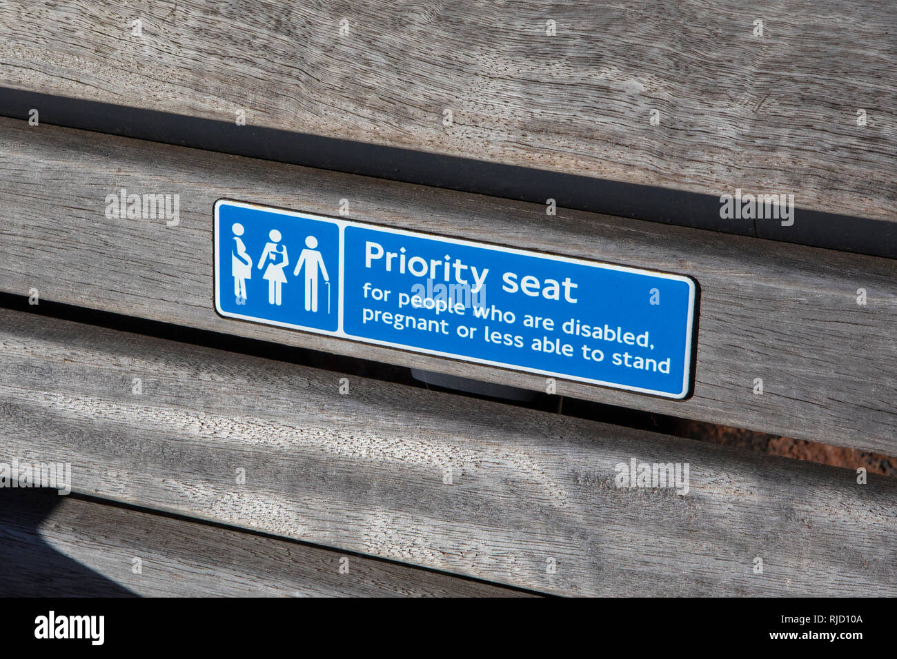 Sign offer seat to elderly hi-res stock photography and images - Alamy