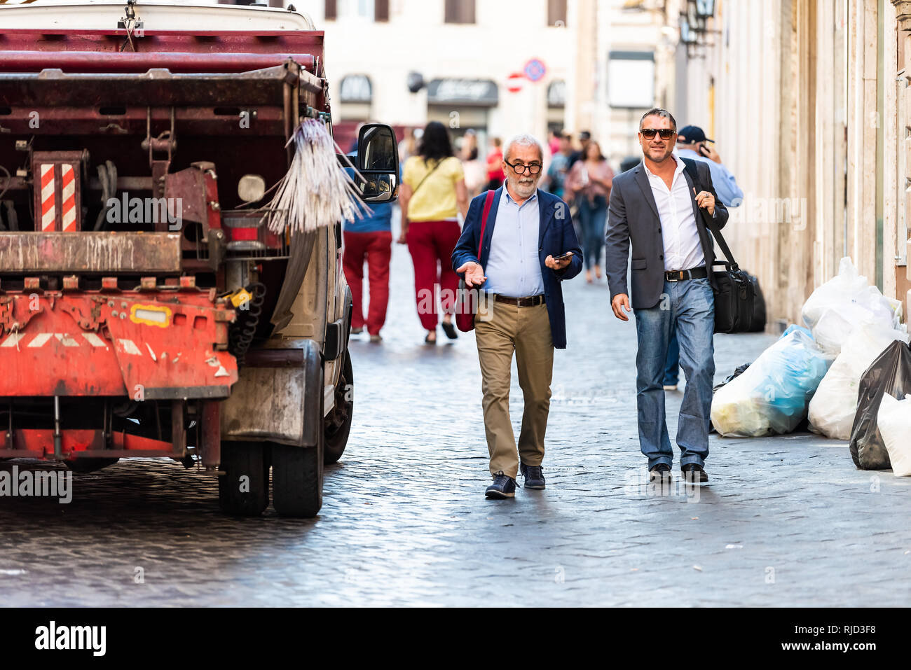 Rome, Italy - September 4, 2018: Two men pedestrians business ...