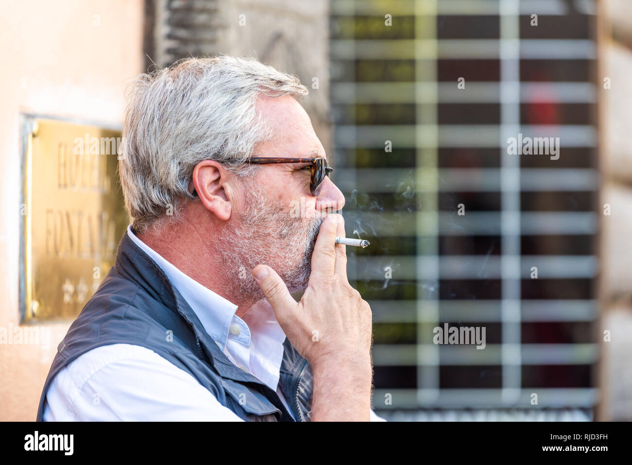 Rome, Italy - September 4, 2018: Closeup of senior man grey hair ...