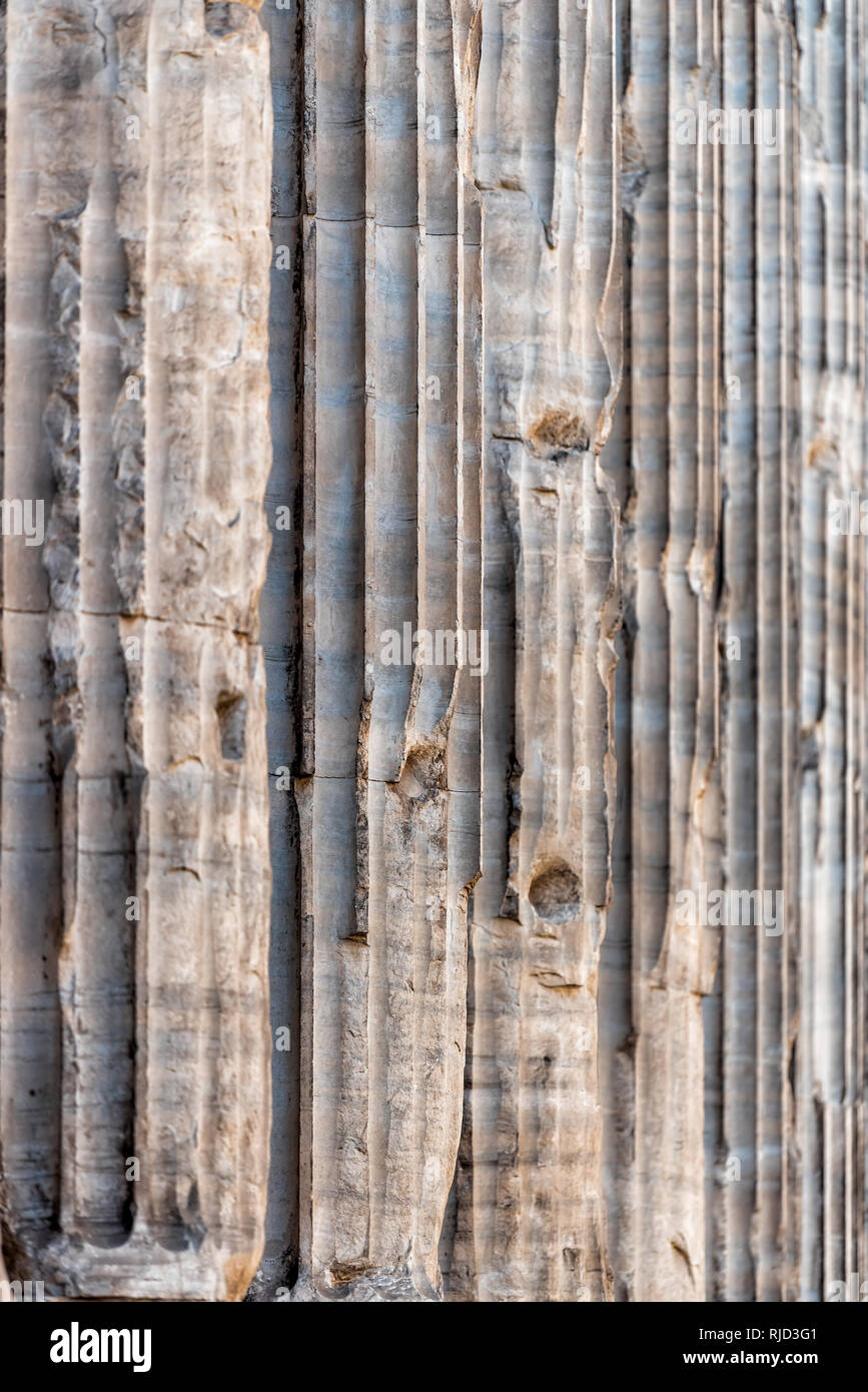 Vertical closeup of old vintage columns of European style building ...