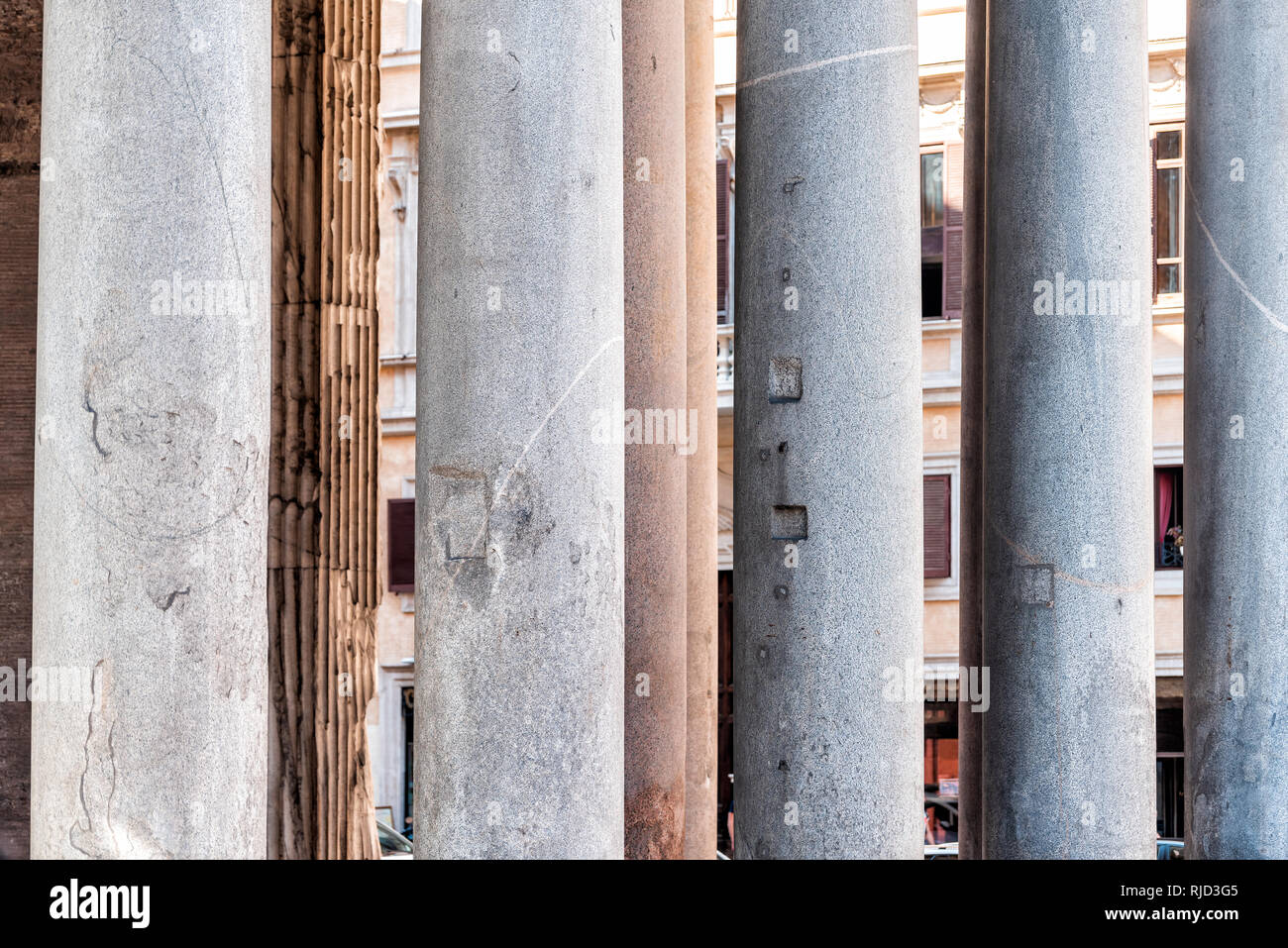 Closeup of old columns of European style building exterior architecture ...