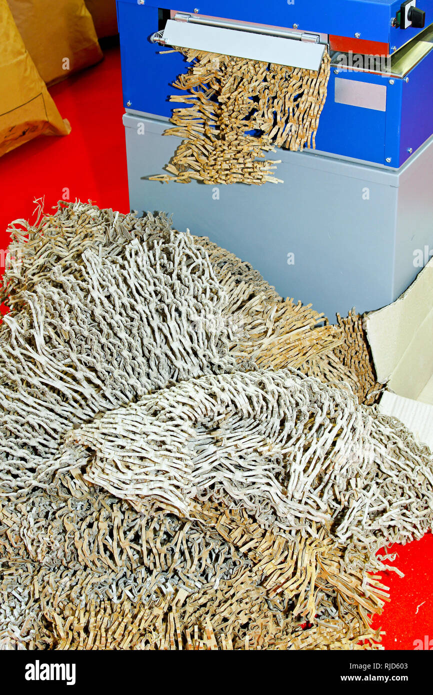 High capacity shredder for cardboard and paper recycling Stock Photo ...