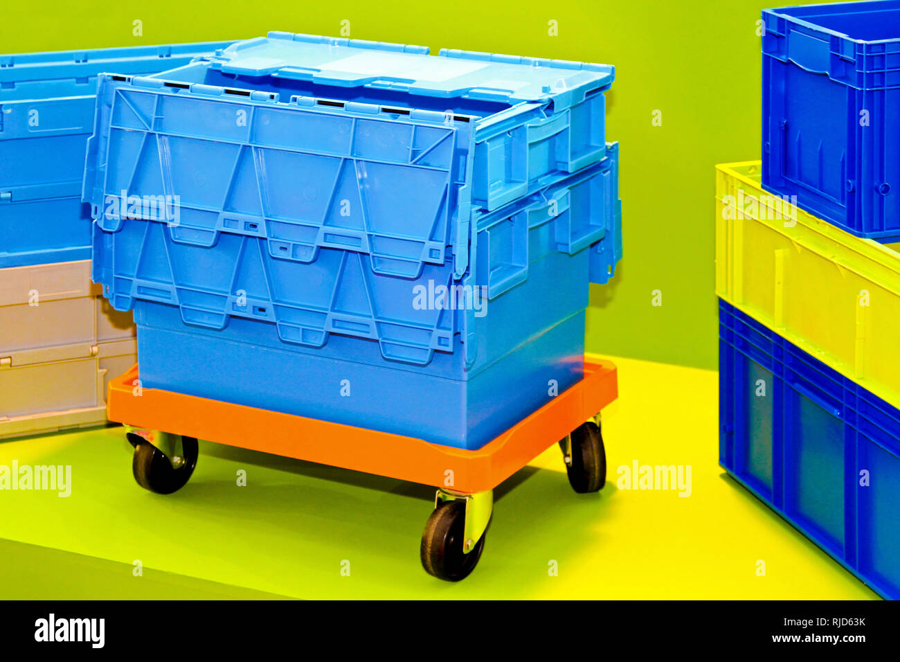 Plastic box with wheels for cargo transport Stock Photo - Alamy