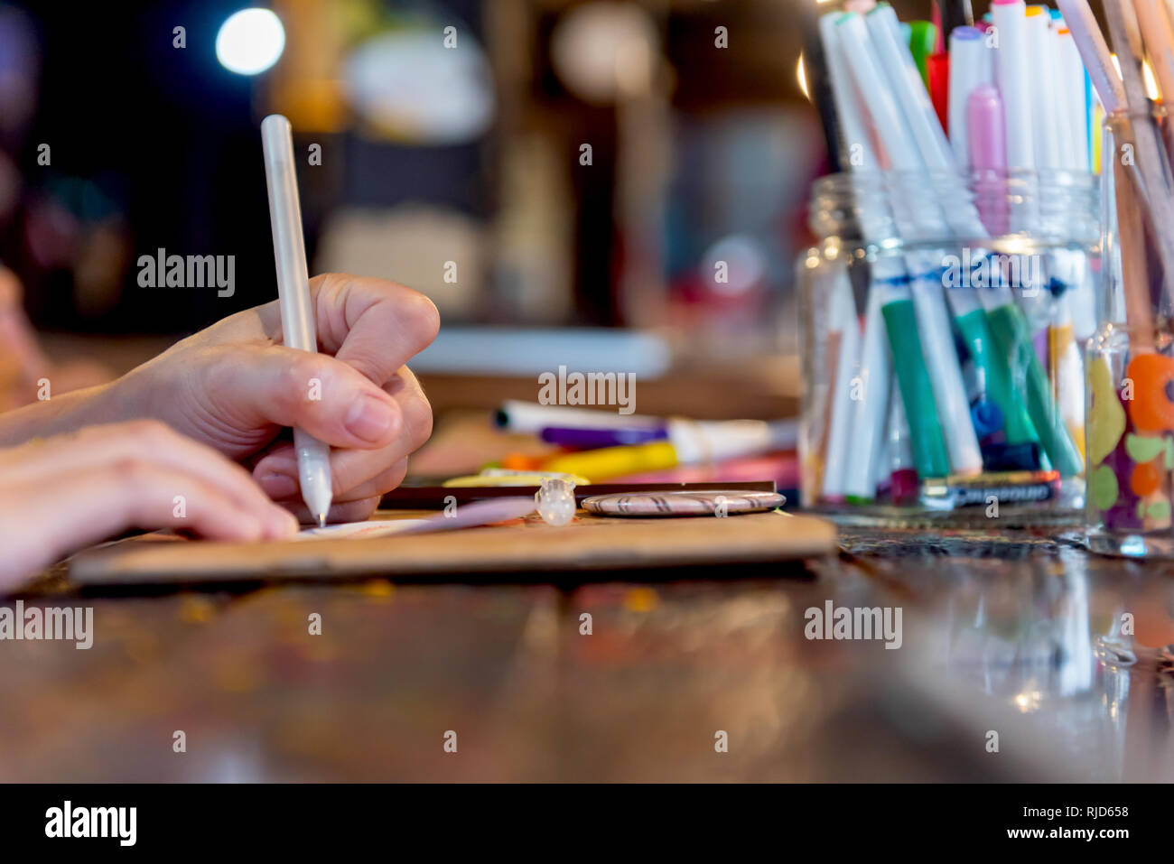 Children learn coloring and painting in classroom. Education and ...