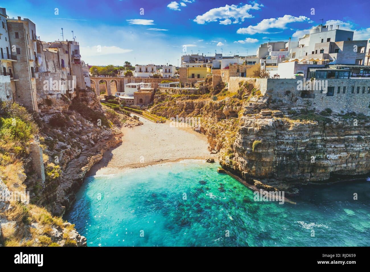 Scenic view of Lama Monachile Cala Porto beach in Polignano a Mare ...