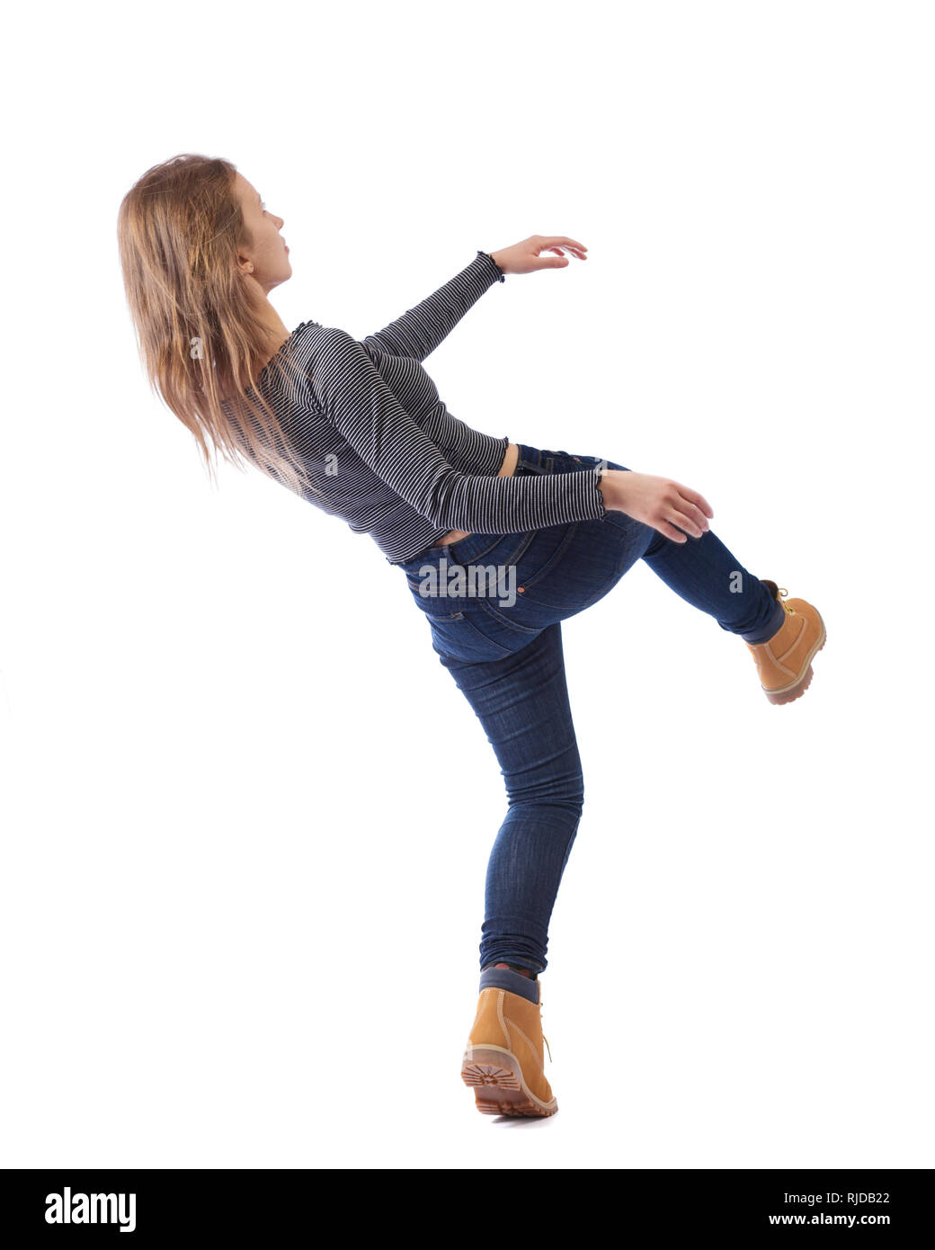 Balancing young woman. or dodge falling woman. Rear view people ...