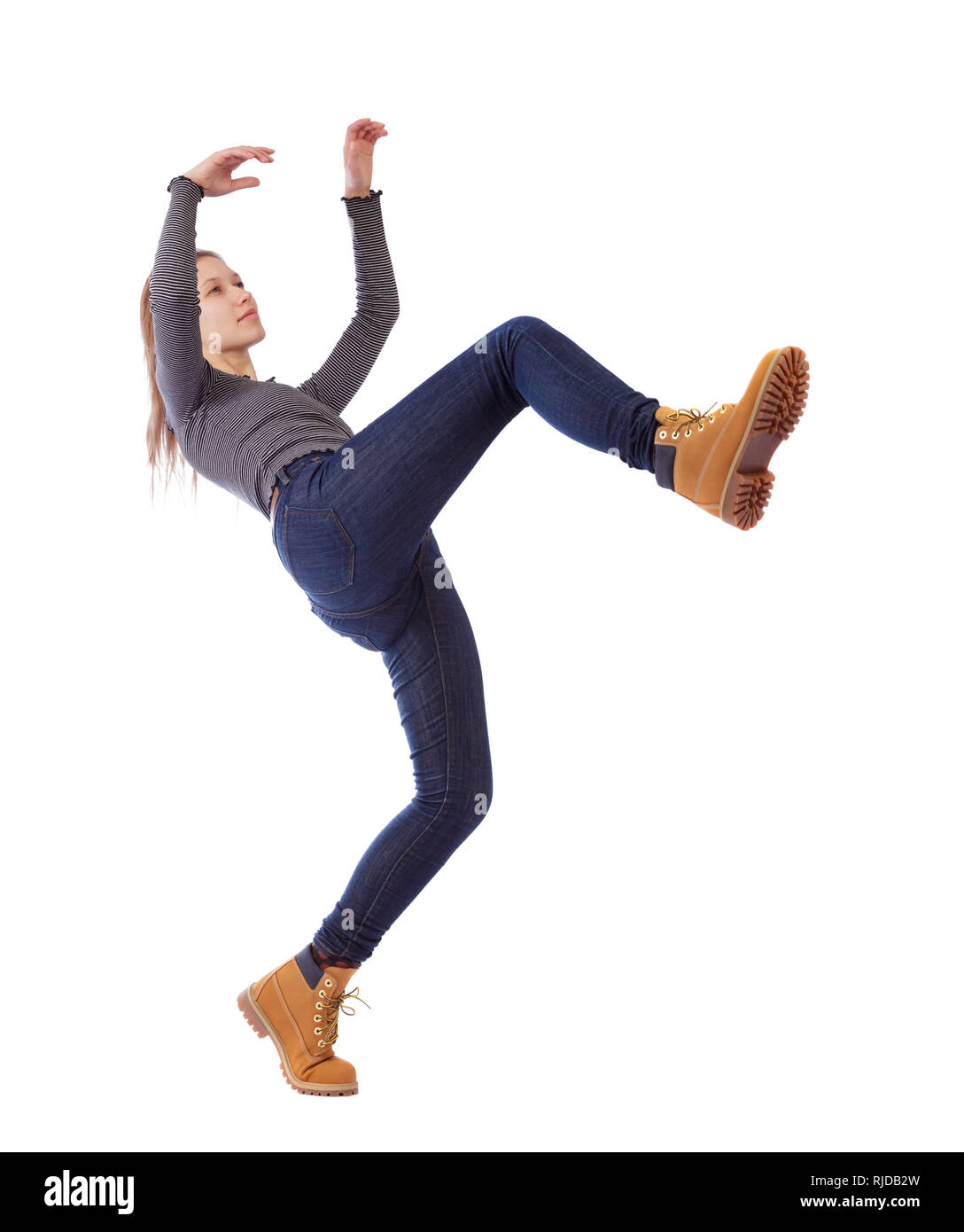 Balancing young woman. or dodge falling woman. Rear view people ...