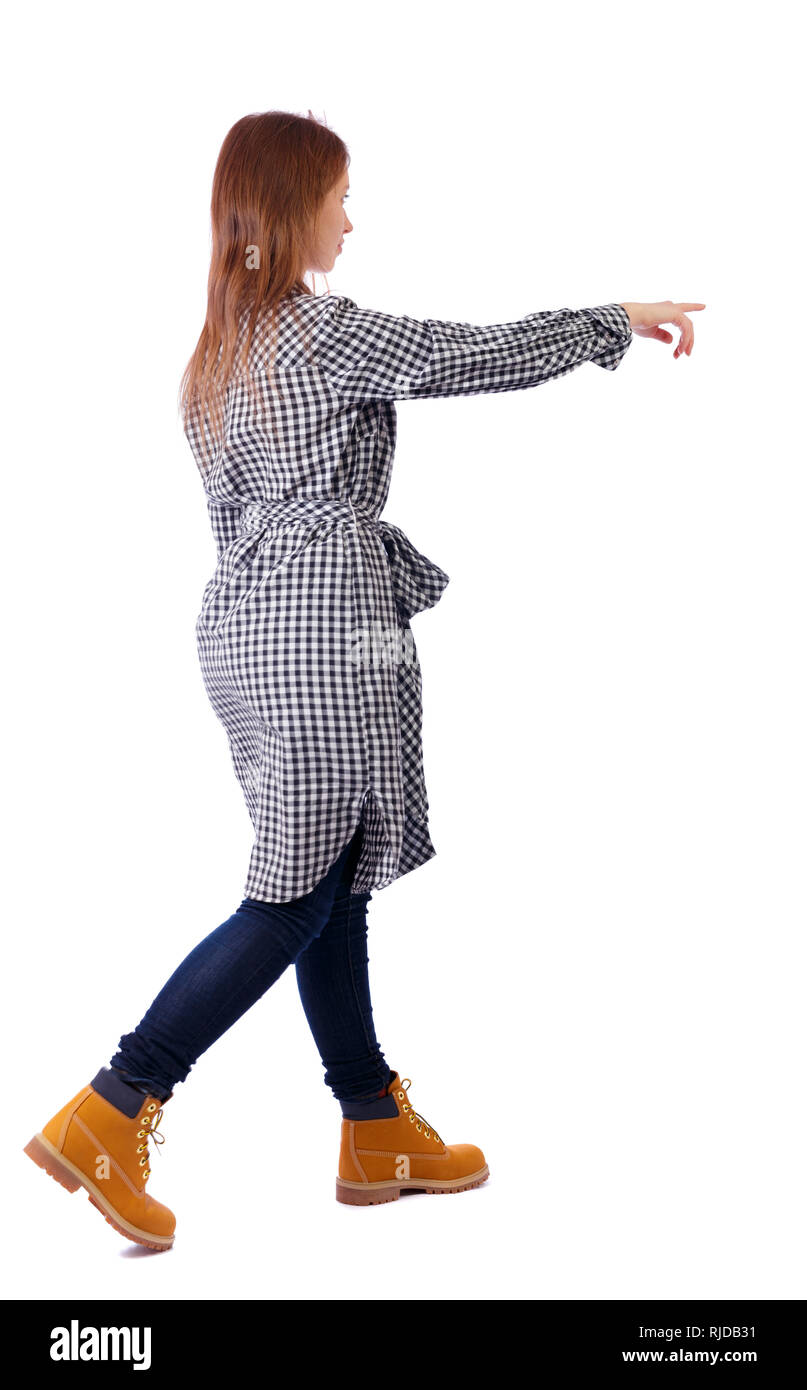 Side view of a girl walking with a pointing hand. going girl showing ...