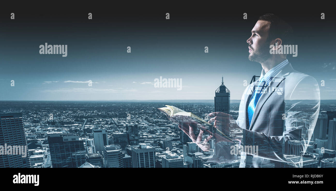 Elegant businessman with diary in hand against night city background ...