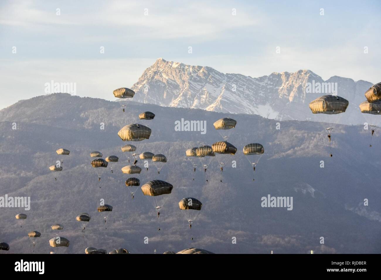 The skies of northern Italy are filled with paratroopers from the 173rd ...