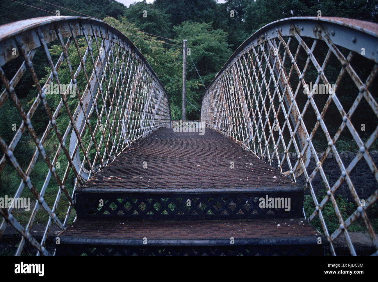Railway passenger metal bridge at British Rail Stromeferry railway ...