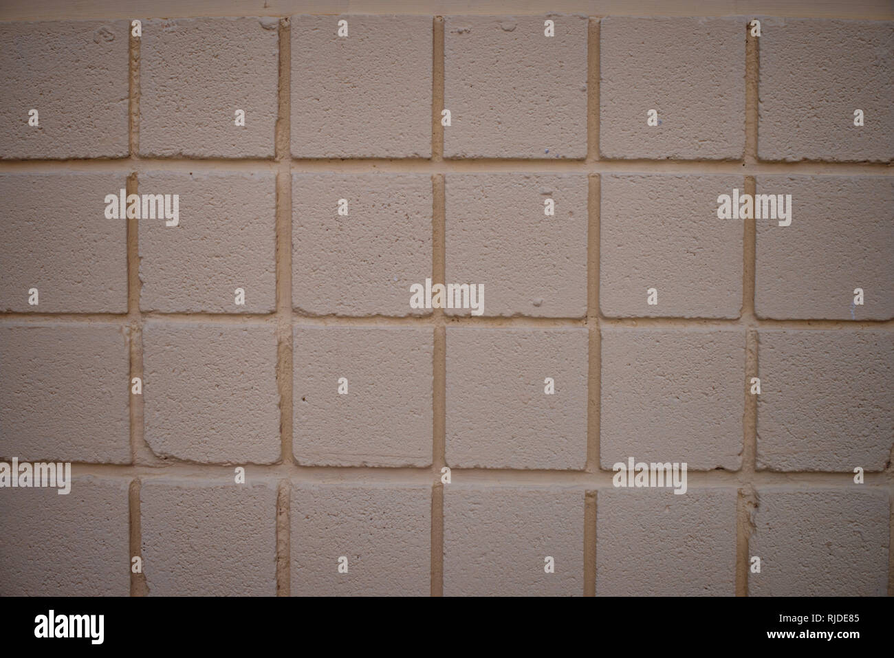 Square patterned concrete wall Stock Photo - Alamy