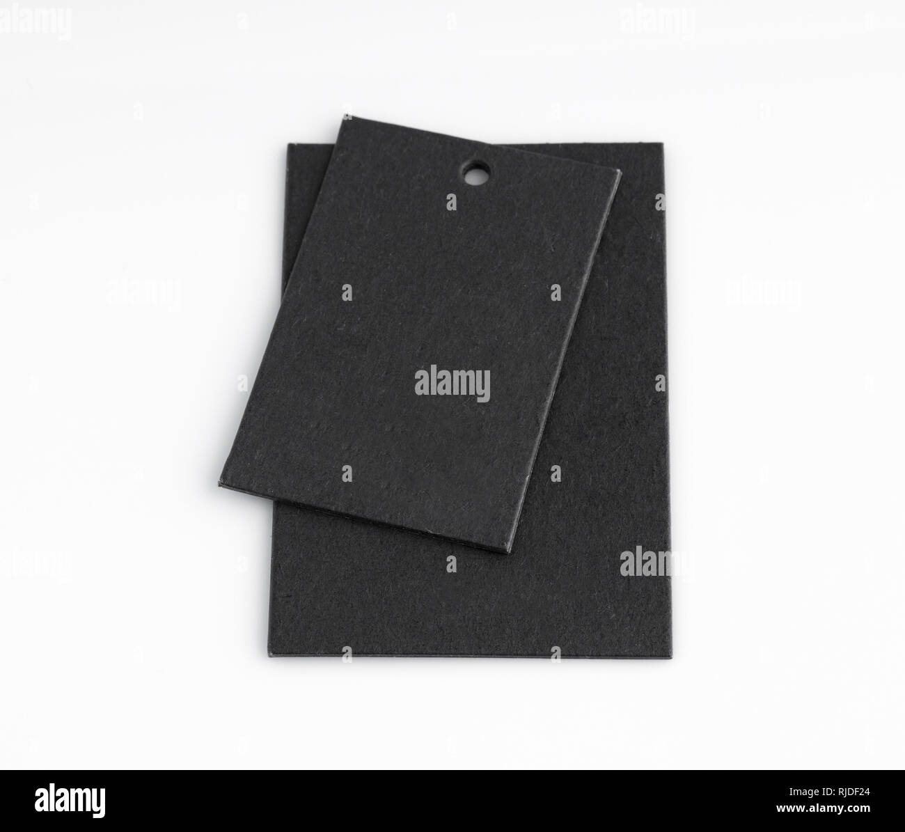 two black price tags isolated on white background Stock Photo - Alamy