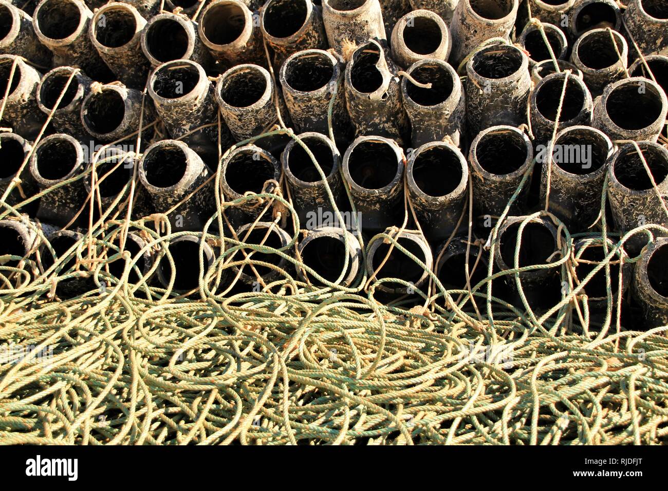 Traps to fish octopus and nets in the pier of Santa Pola, Spain Stock ...