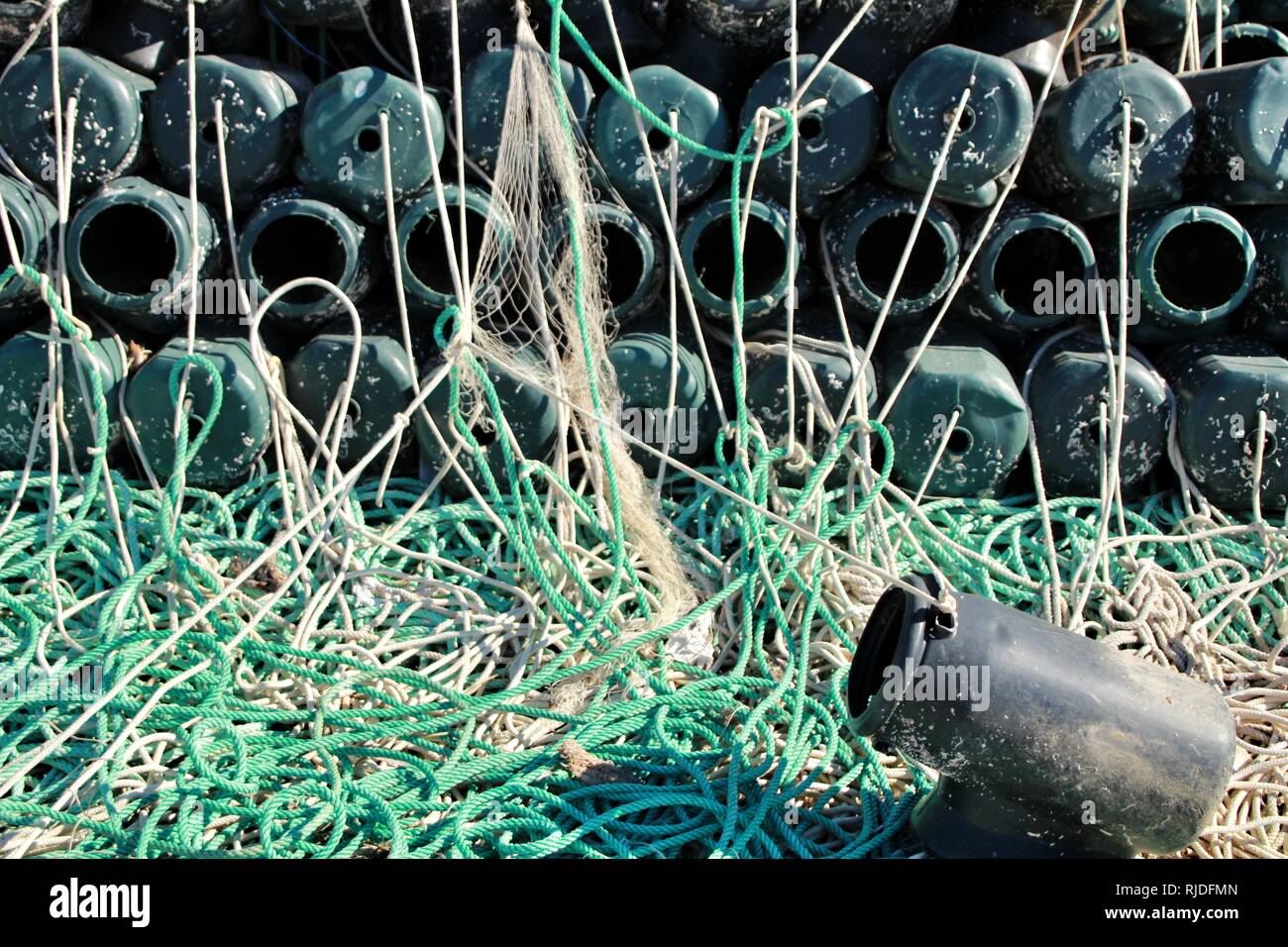 Traps to fish octopus and nets in the pier of Santa Pola, Spain Stock ...