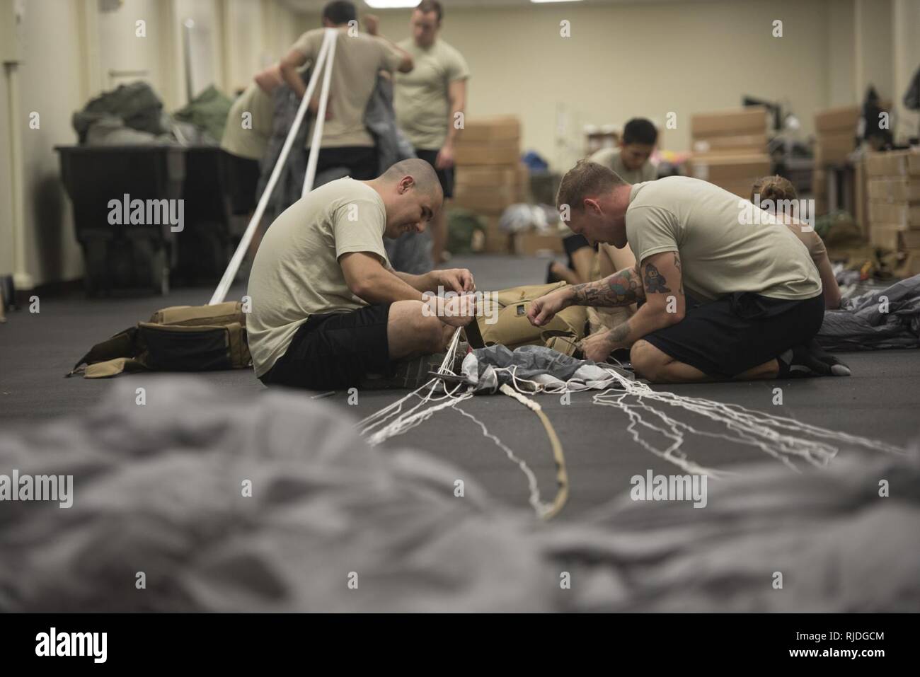 U.S. Air Force Tech. Sgt. Sean Draney, left, 31st Rescue Squadron ...