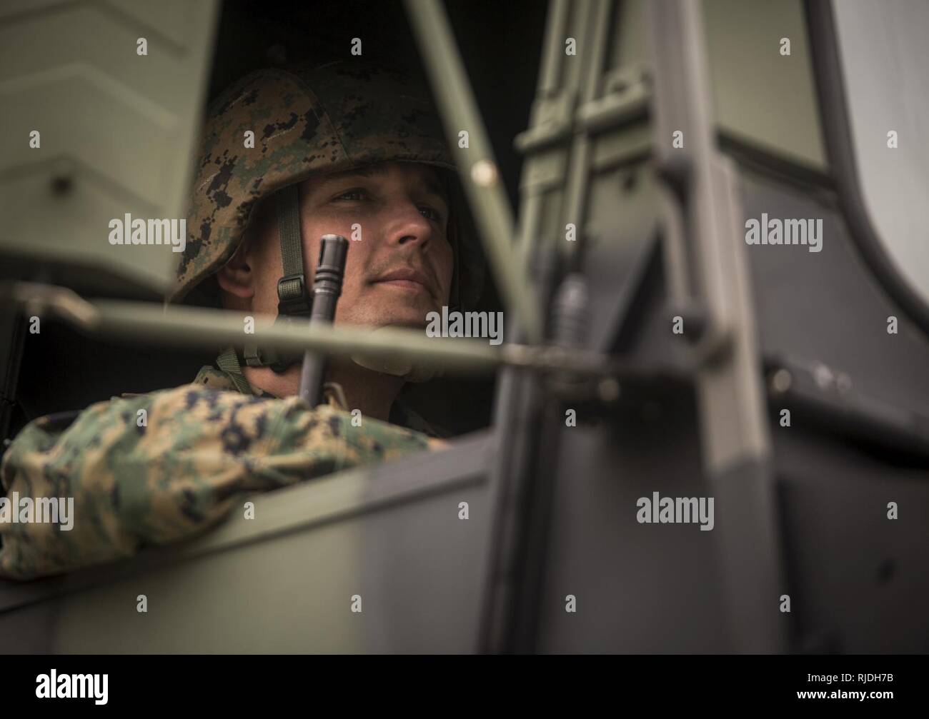 U.S. Marine Master Sgt. John W. Miles leads a convoy operation during ...