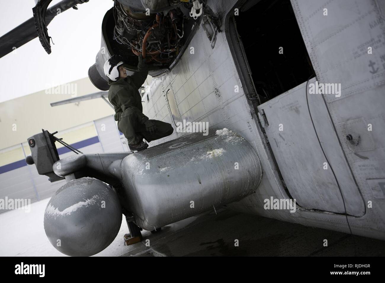 Pilot, conducts a pre flight inspection hi-res stock photography and ...