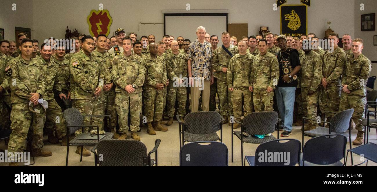 U.S. Army retired Lt. Gen. Robert F. Foley poses for a group photo with ...