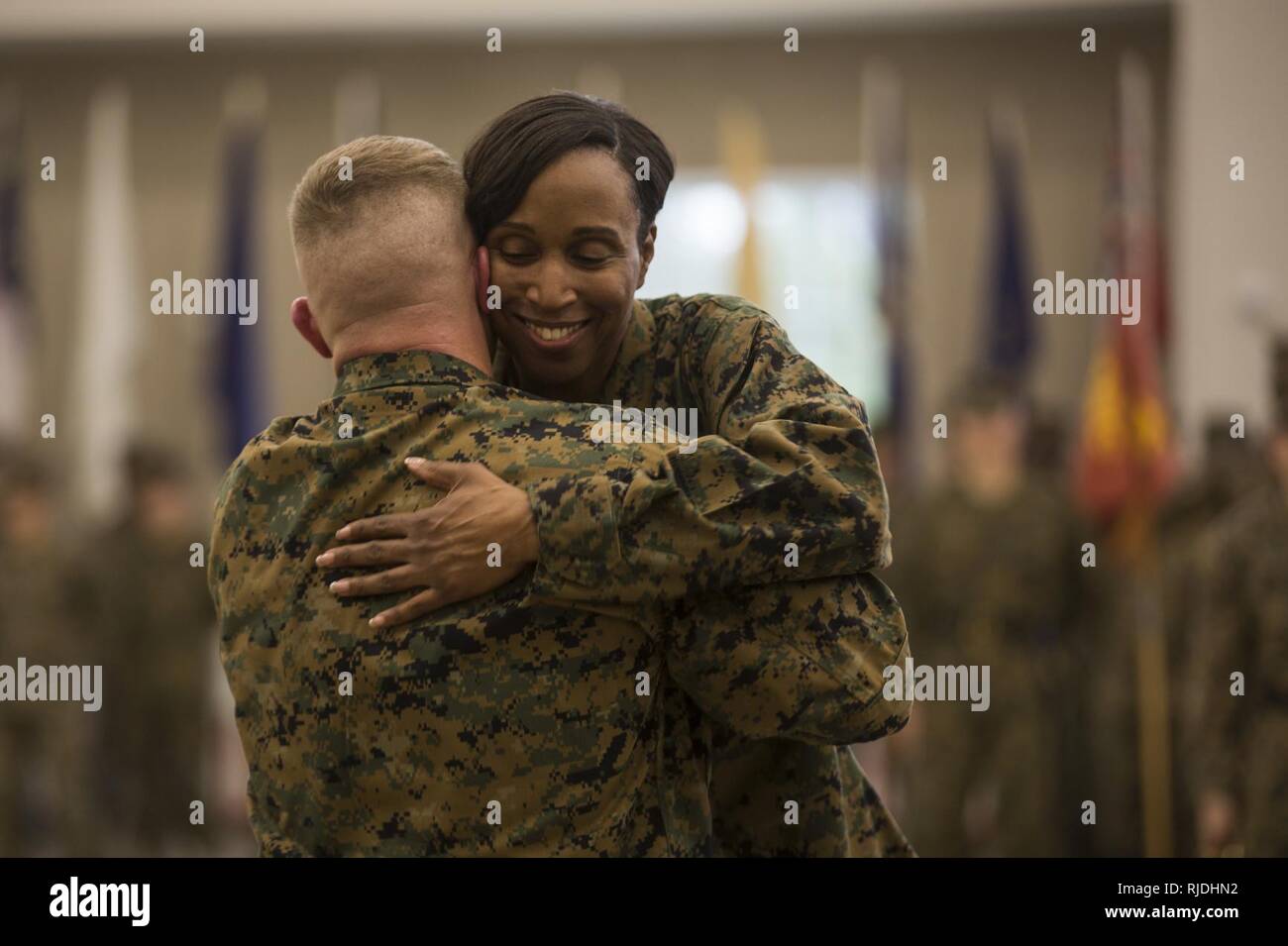 Sgt. Maj. Robin Fortner embraces Sgt. Maj. Dylan Goldman after the ...