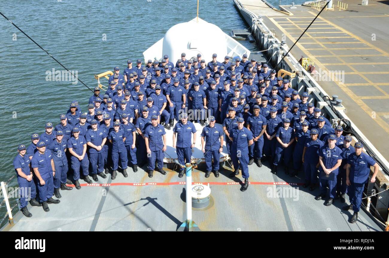 The crew of the U.S. Coast Guard Cutter Sherman (WHEC 720), a 378-foot ...