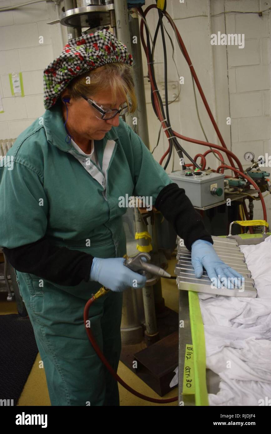 Crane Army Ammunition Activity employees produce MJU 61 A/B flares for ...