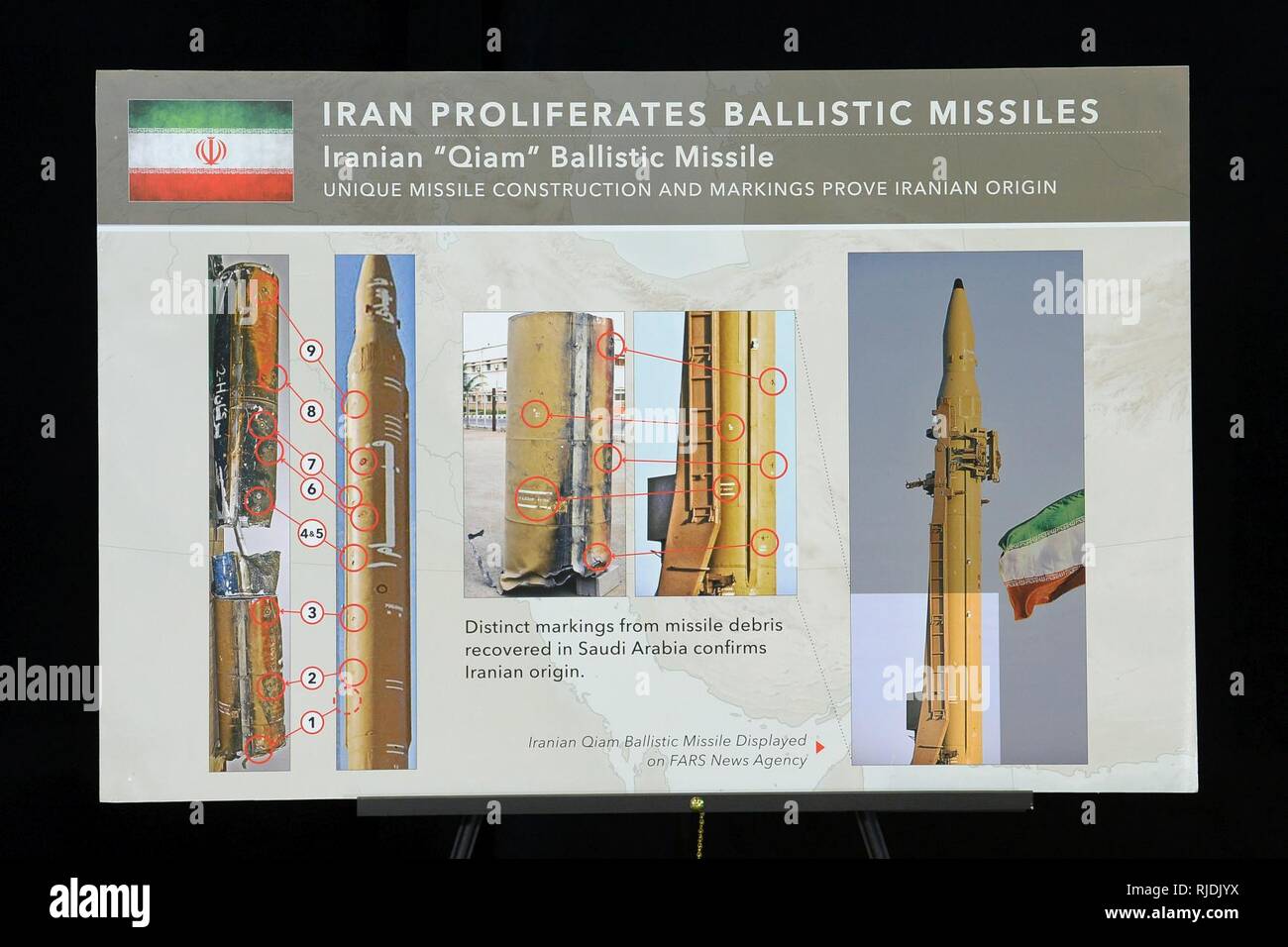 A sign explains how Iranian “Qiam” ballistic missile remnants are ...