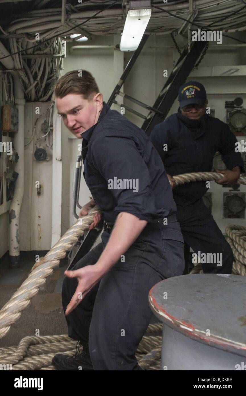 SASEBO, Japan (Jan. 23, 2018) Seaman Apprentice Dylan Larson, left ...