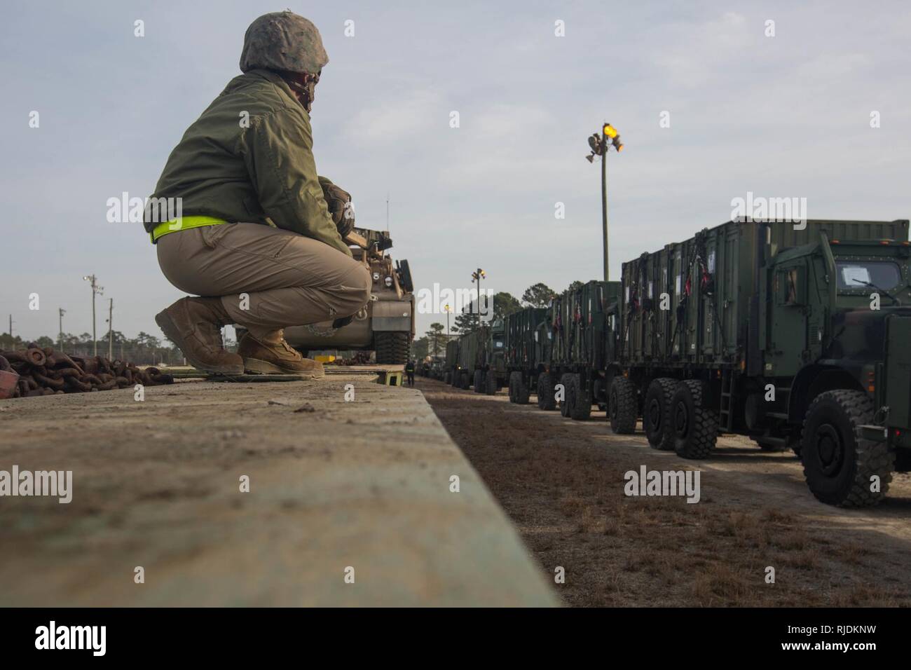 A U.S. Marine with 2nd Tank Battalion, 2nd Marine Division observes ...
