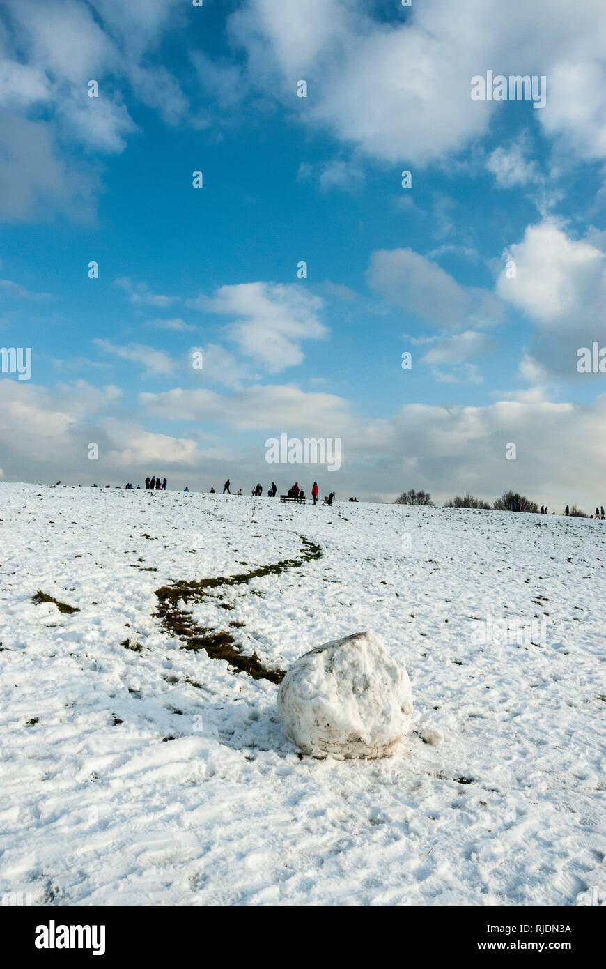 Snowball rolling down hill hi-res stock photography and images - Alamy