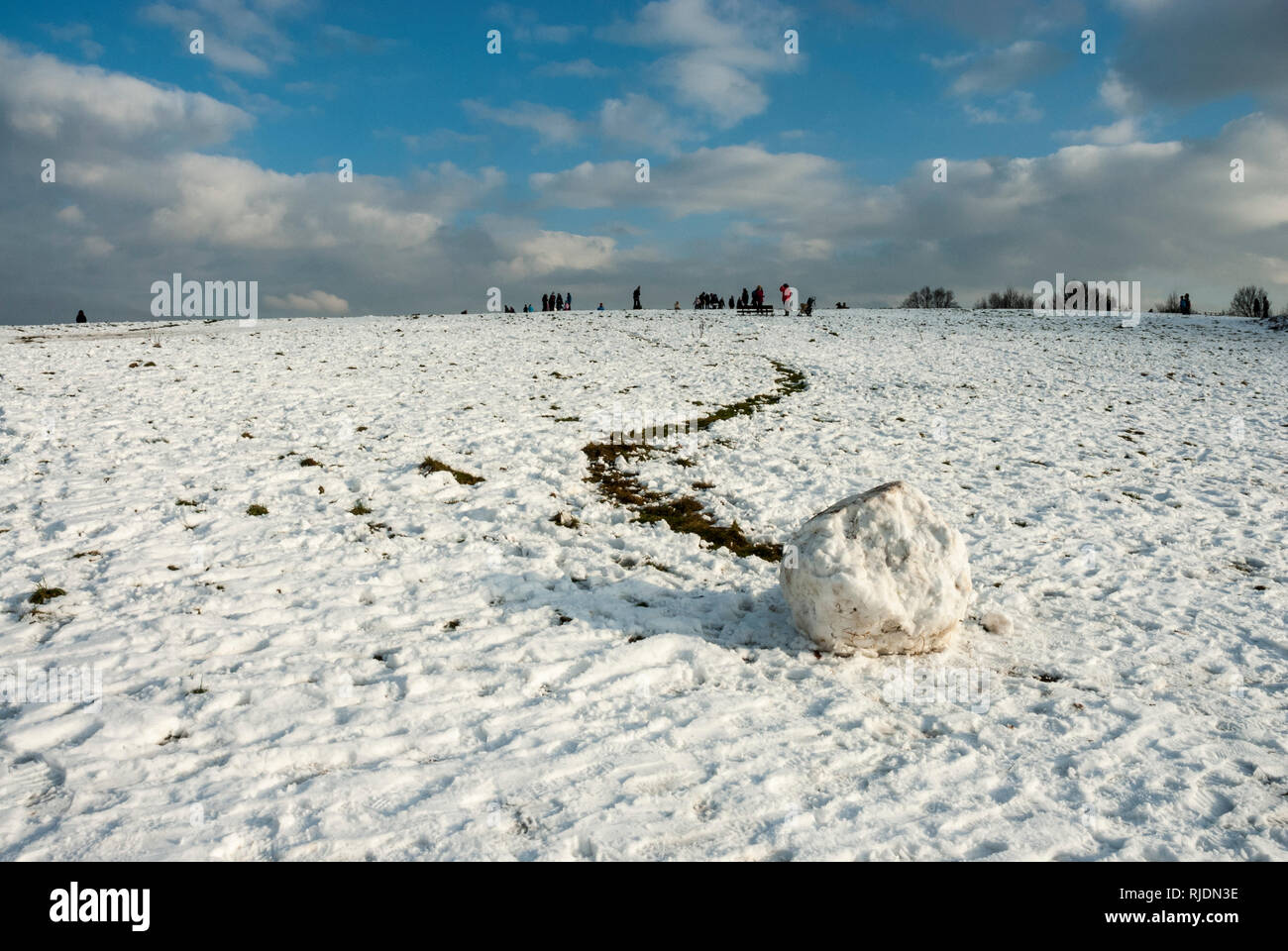 Rolling giant snowball hi-res stock photography and images - Alamy