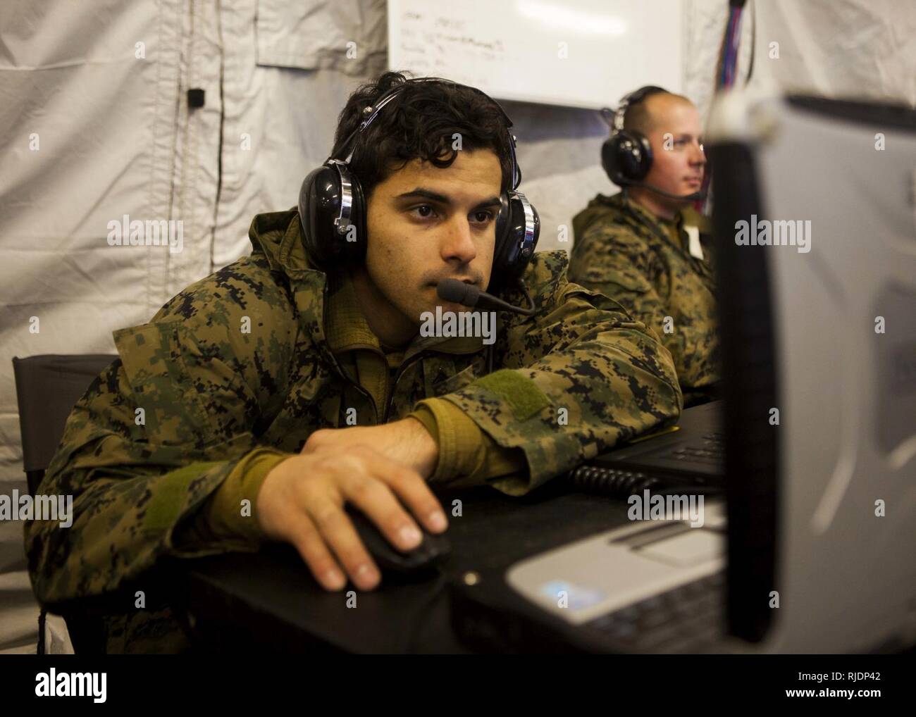 U.S. Marine Corps Cpl. Quinton P. Ellis, a tactical air defense ...
