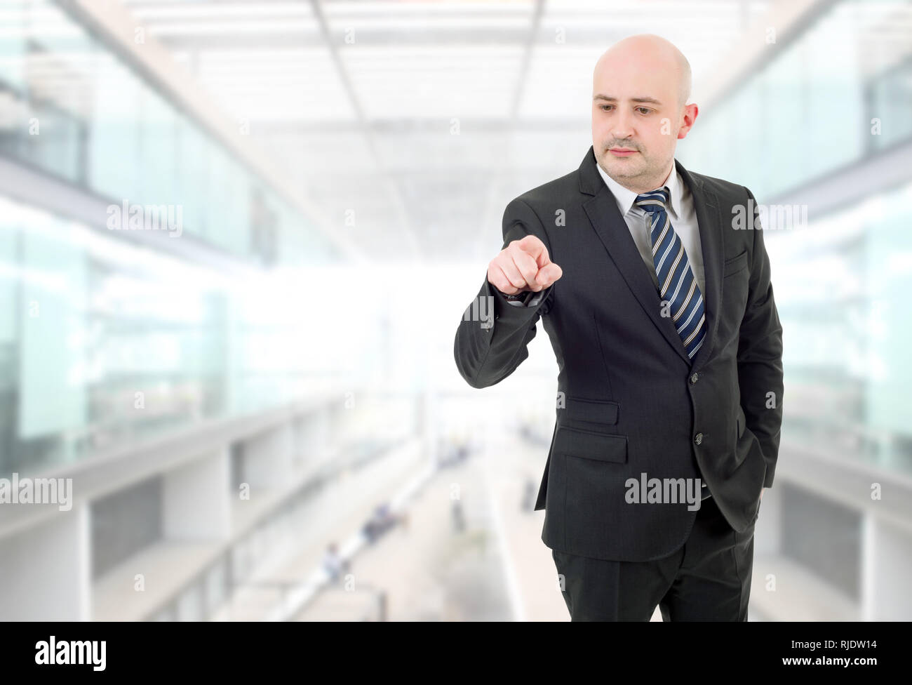 business man pointing, at the office Stock Photo - Alamy