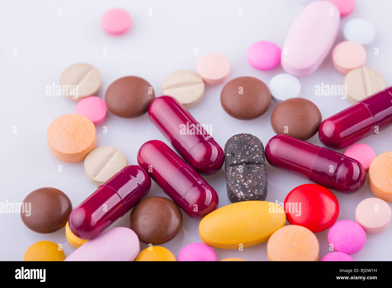 different Tablets pills capsule heap mix therapy drugs Stock Photo - Alamy