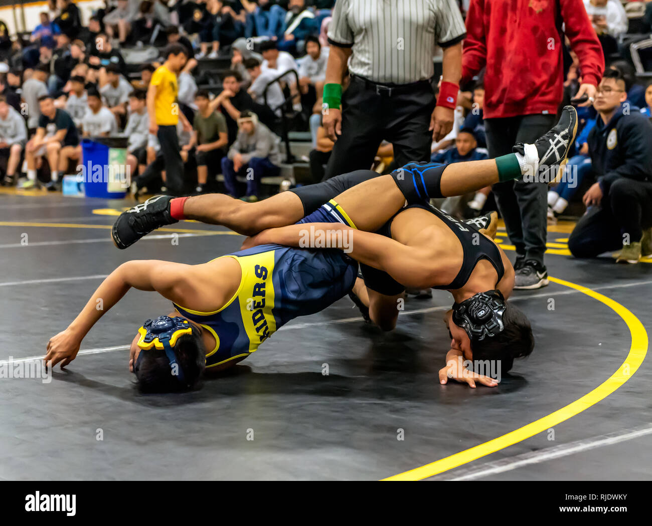 Wrestler from Pacifica High School attempting a tilt on Channel Islands ...