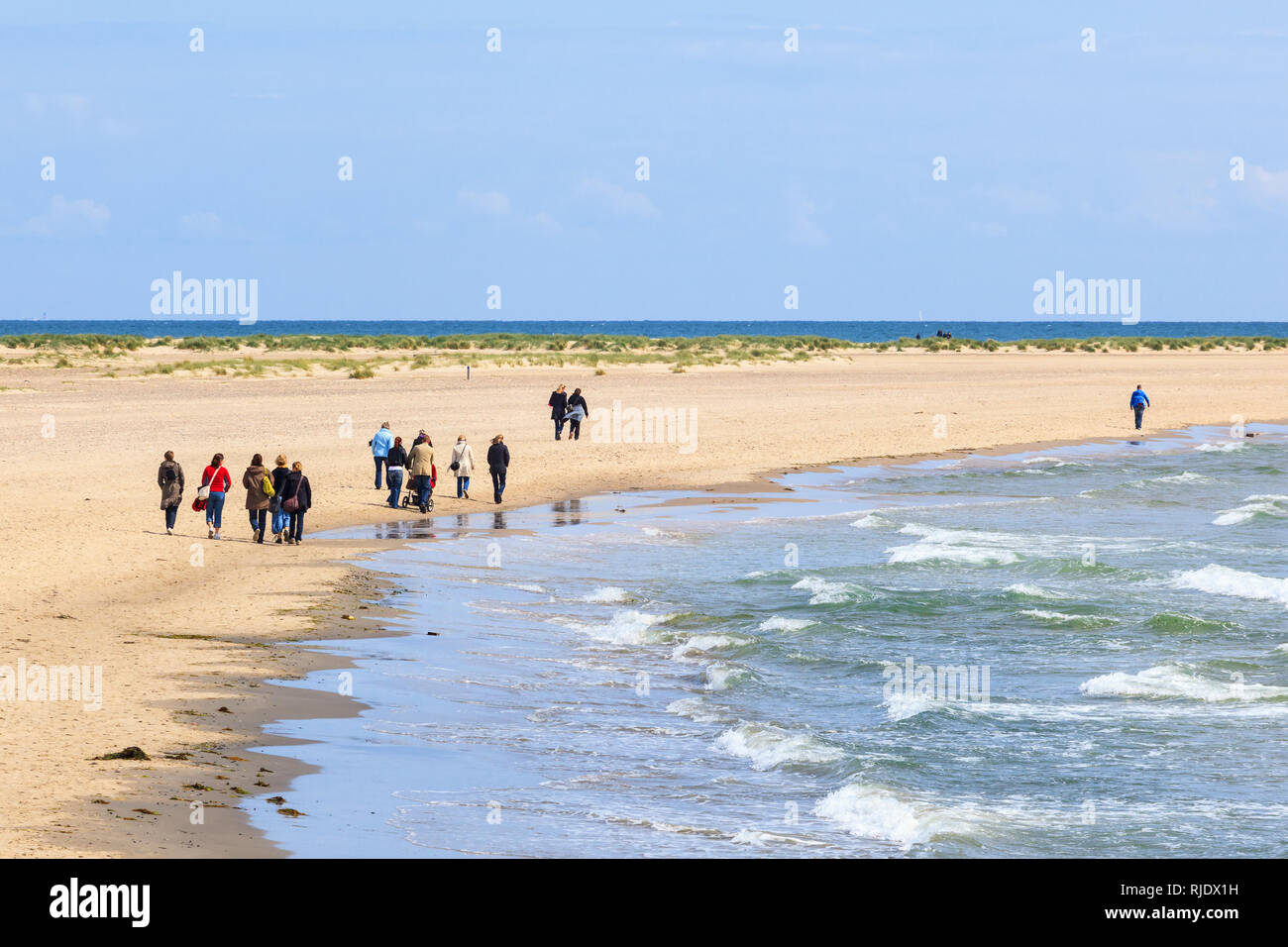 People who walk on the beach Stock Photo - Alamy