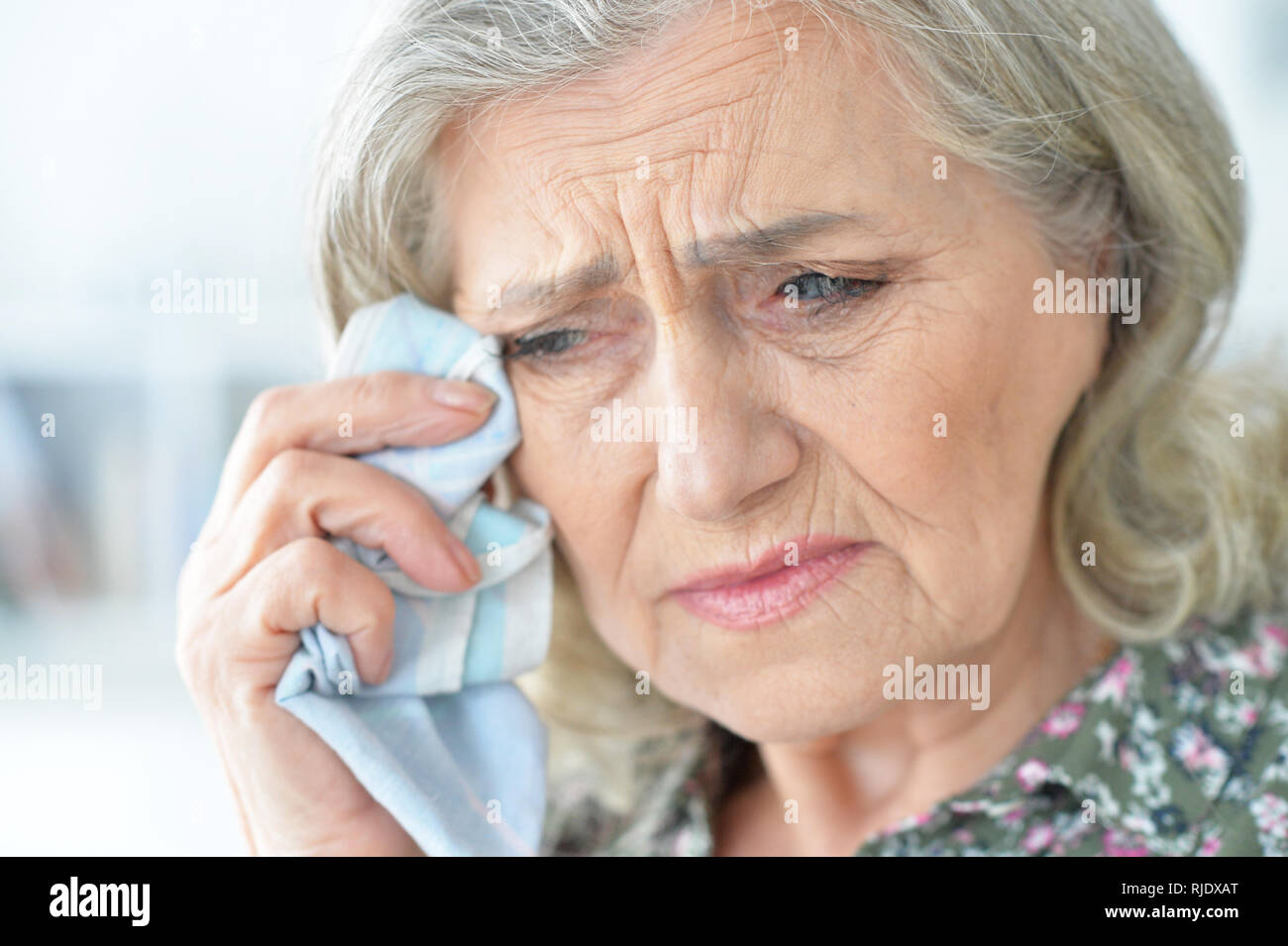 close-up portrait of stressed senior woman crying Stock Photo - Alamy