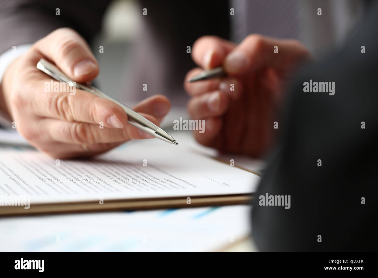 Male arm in suit and tie fill form clipped Stock Photo - Alamy