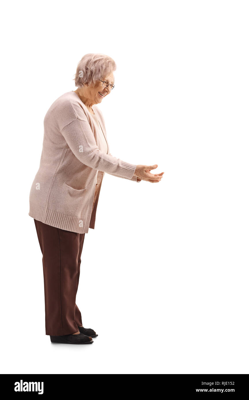 Full length profile shot of an elderly lady waiting to receive ...