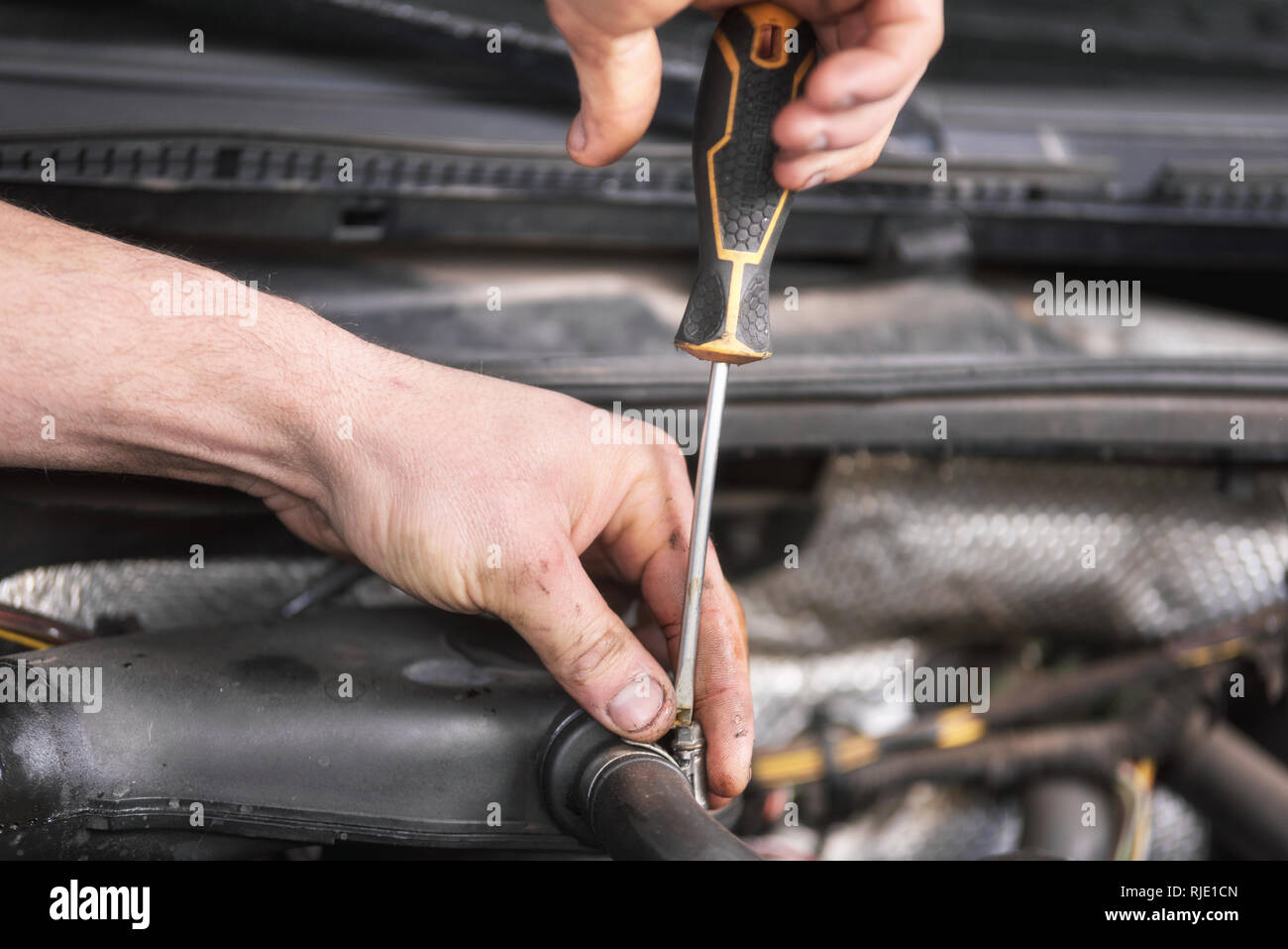 Mechanic working on car engine hi-res stock photography and images - Alamy