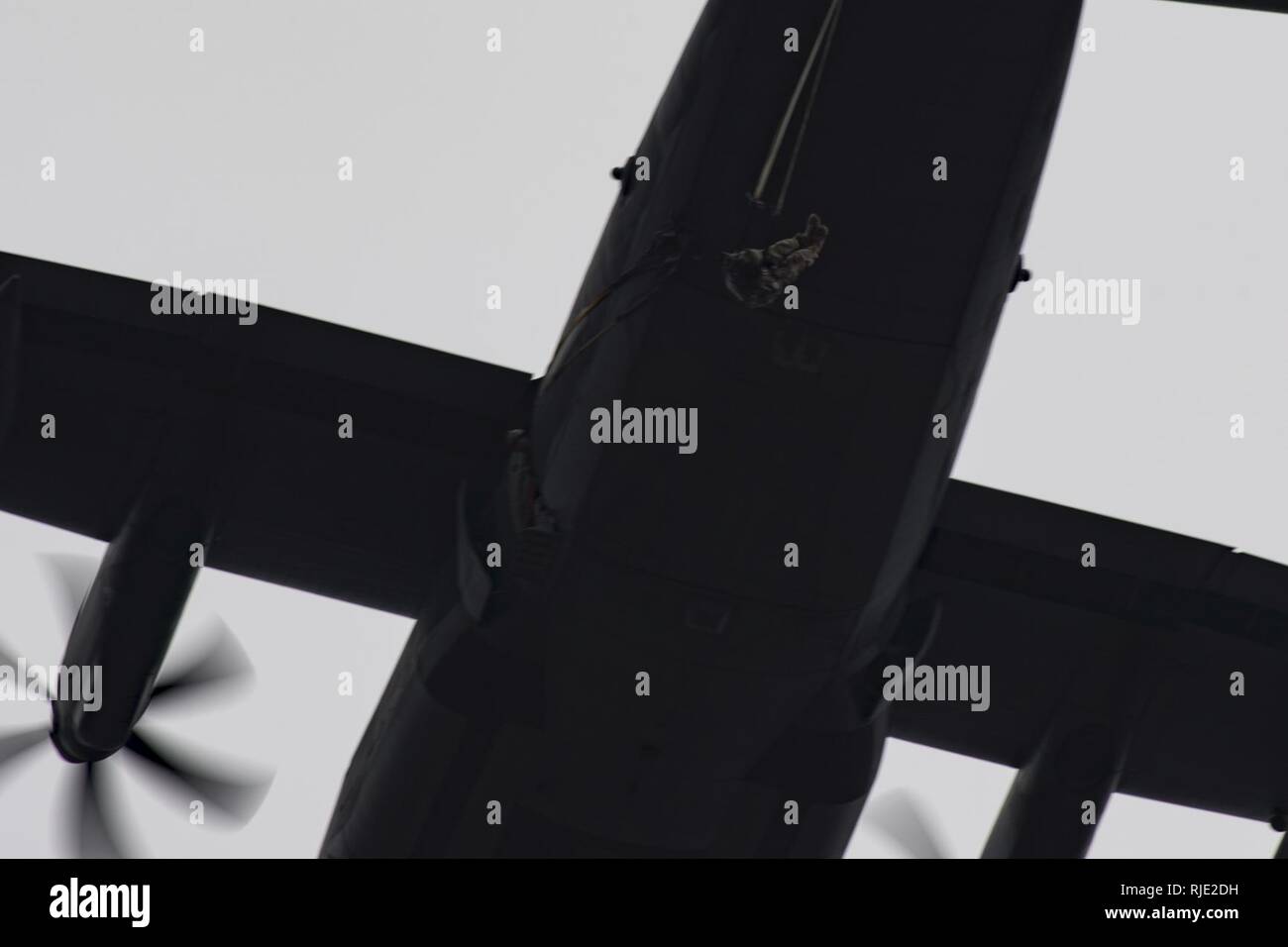 Airmen from the 820th Base Defense Group exit an HC-130J Combat King II ...