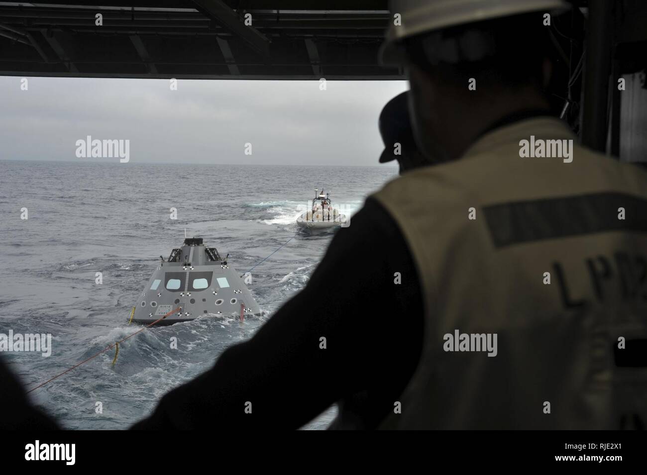 PACIFIC OCEAN (Jan. 18, 2018) Capt. Dennis Jacko watches as NASA’s ...