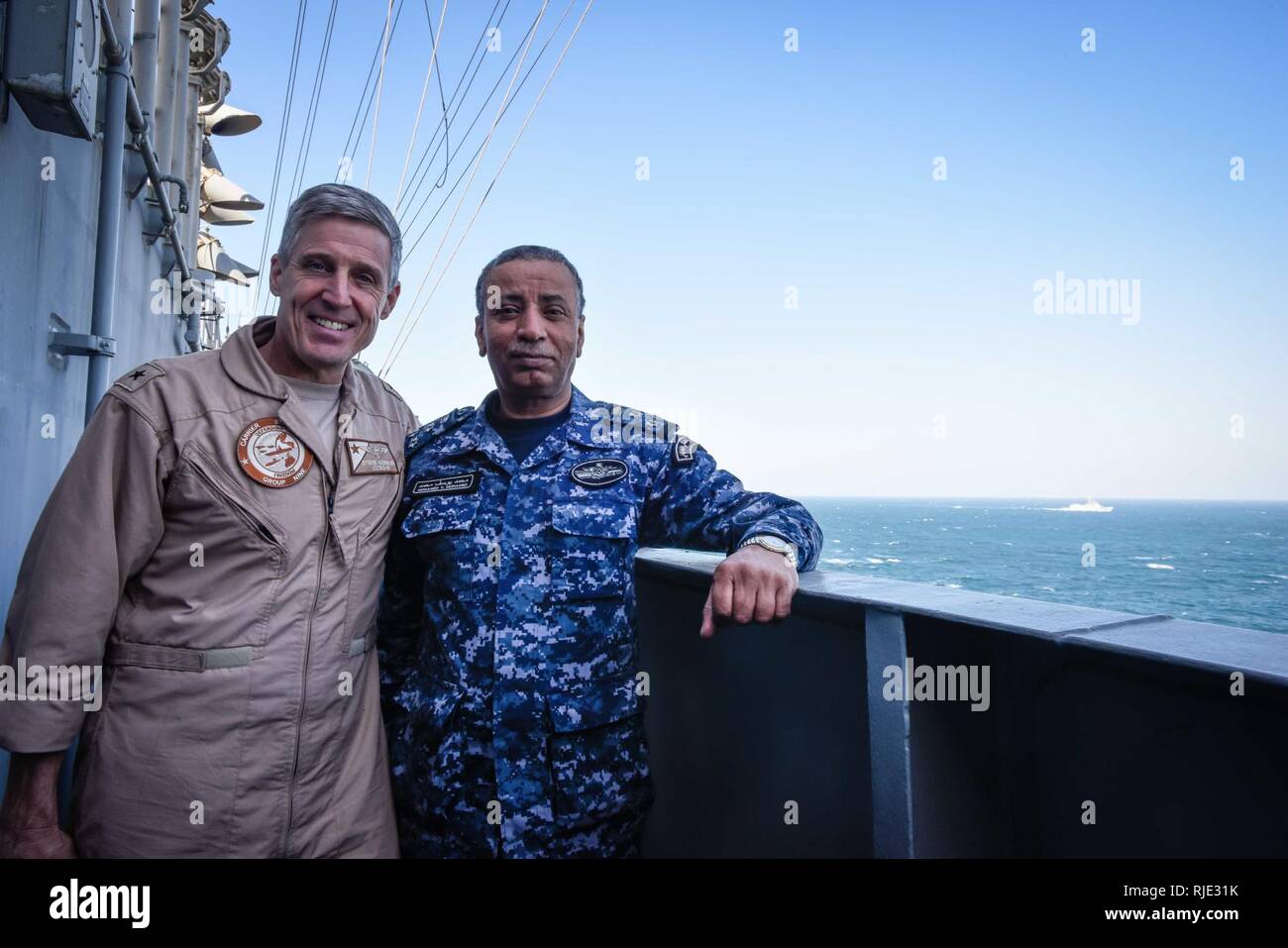 ARABIAN GULF (Jan. 16, 2018) Rear Adm. Steve Koehler, left, commander ...