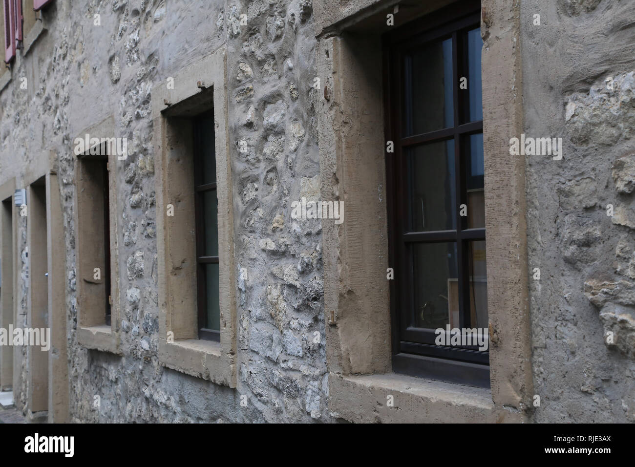 Basement windows in the old city street Stock Photo - Alamy