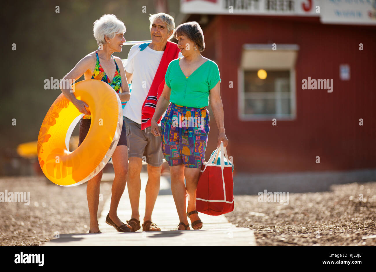 Three smiling seniors having fun on vacation together Stock Photo - Alamy