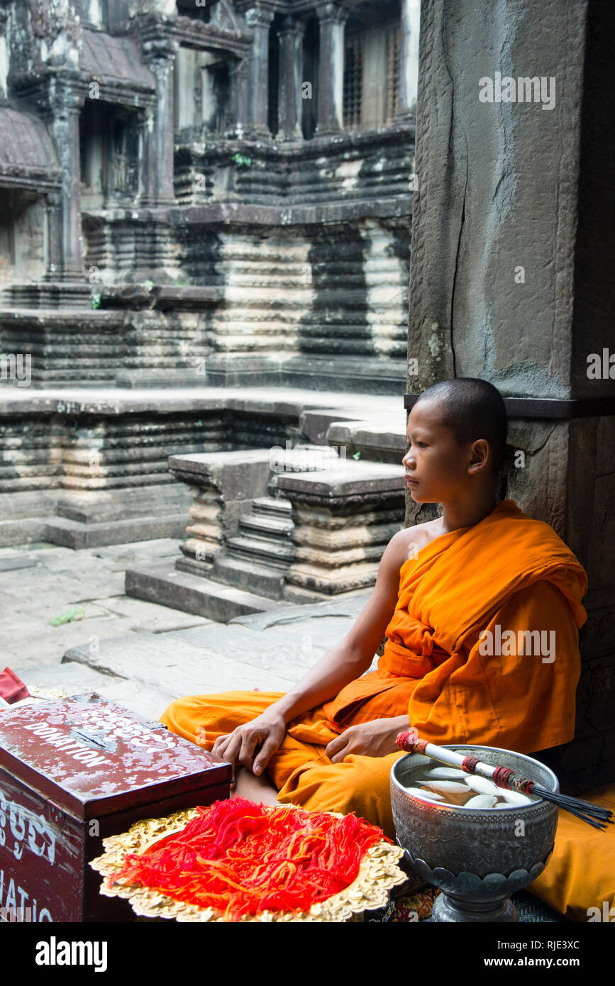 Saffron robe hi-res stock photography and images - Alamy