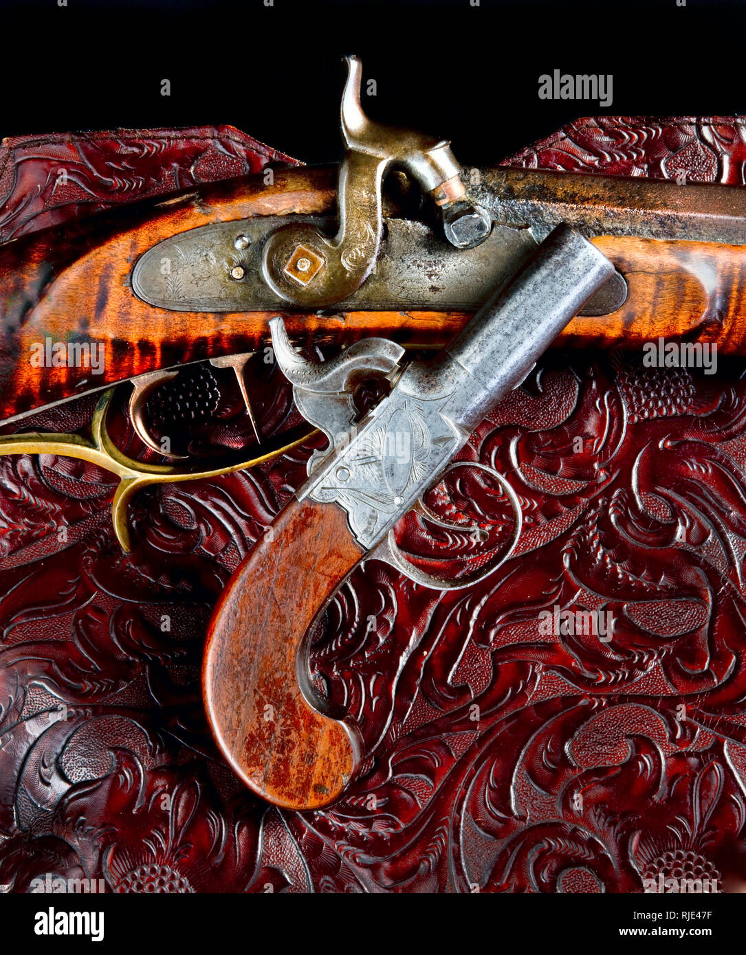 Antique percussion rifle and pistol made around 1840 Stock Photo - Alamy