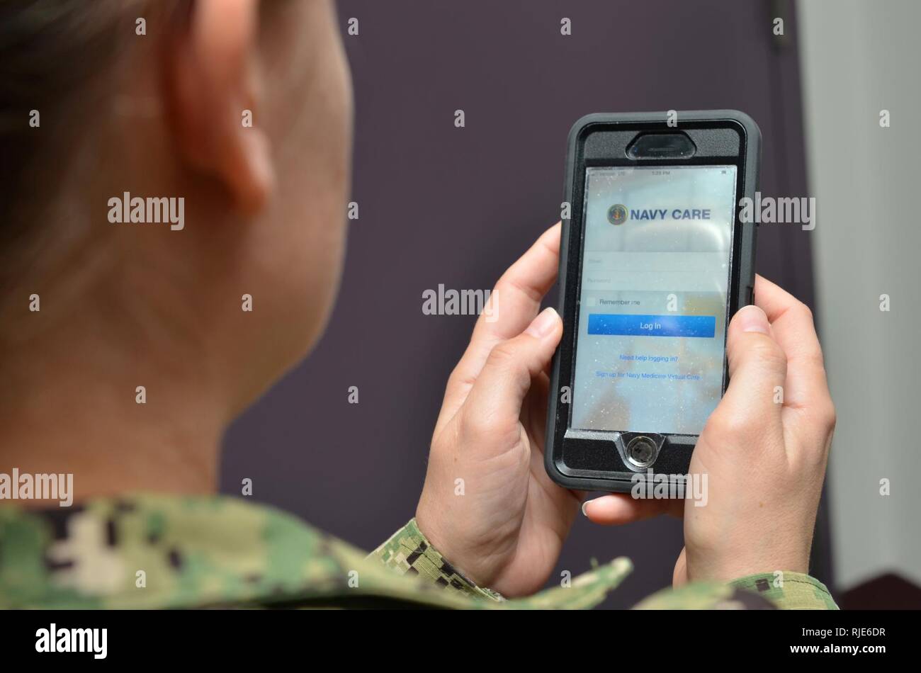 JACKSONVILLE, Fla. (Jan. 22, 2018) A Sailor uses the Navy Care app on ...