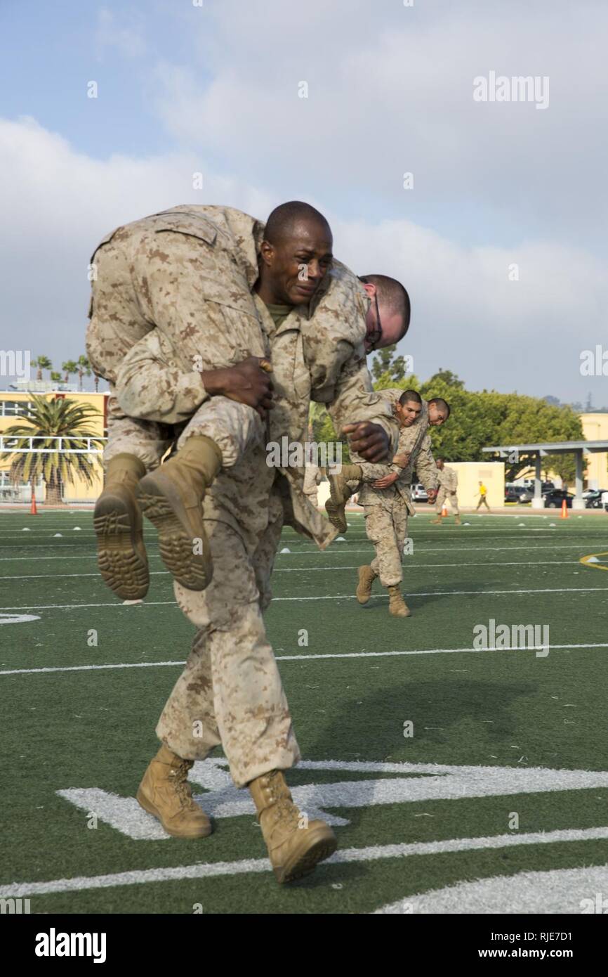 Firemans carry hi-res stock photography and images - Alamy