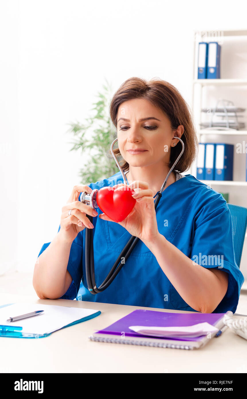 Female doctor cardiologist working in the hospital Stock Photo - Alamy